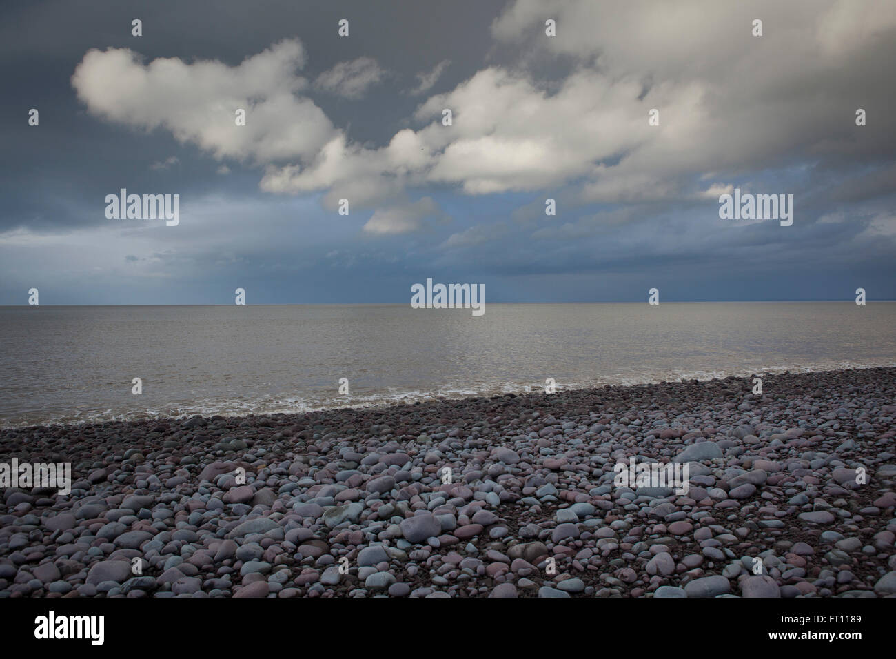 A dramatic brooding seascape, calm at first with the posibility of a ...