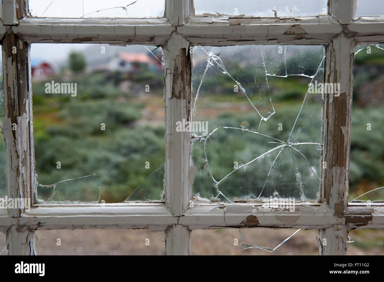Broken window glass in a wooden house, Qaqortoq, Kujalleq, Greenland ...