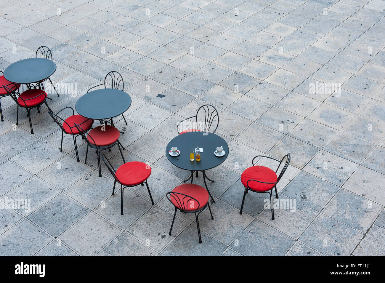Chairs and tables of a pavement cafe, Split, Split-Dalmatia, Croatia ...
