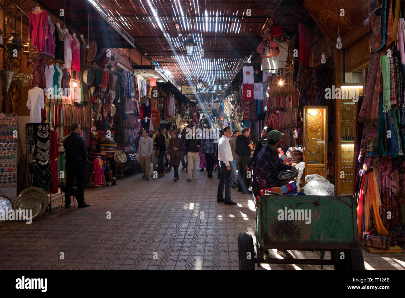 Merchants and tourists in the souk, Marrakech, Morocco Stock Photo - Alamy