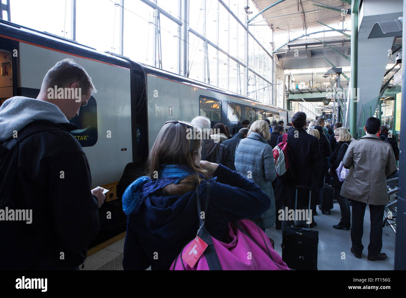 People queuing by the Eurostar train on the platform at Lille, France ...