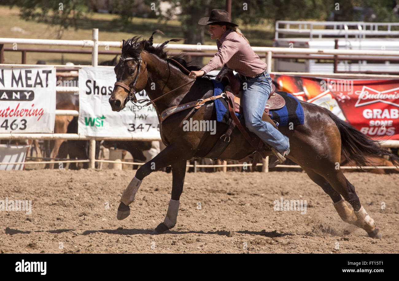 Barrel racing action at a rodeo in Cottonwood, California Stock Photo ...