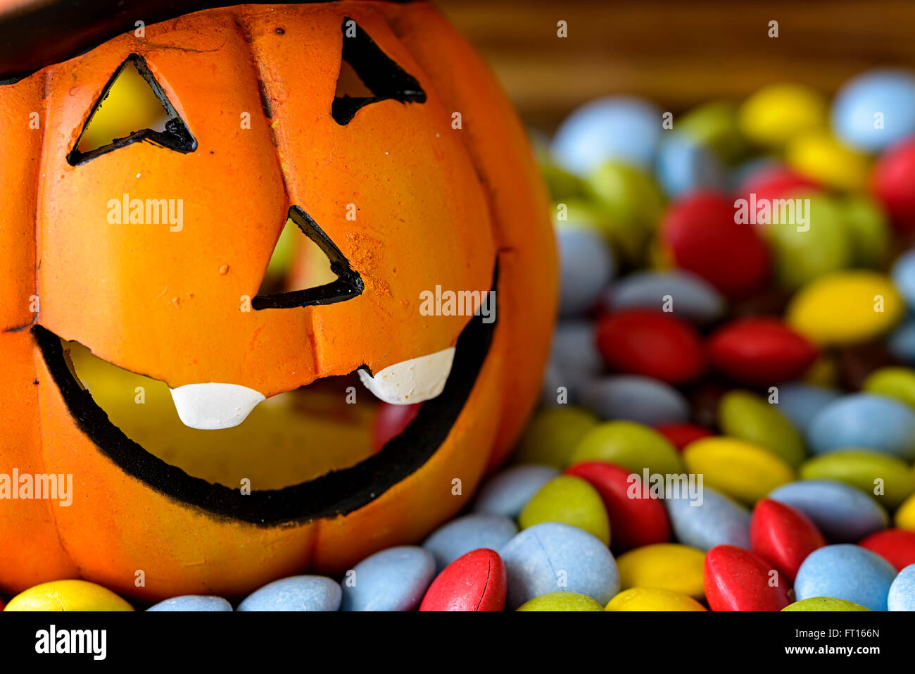 halloween pumpkin with chocolate candy Stock Photo - Alamy