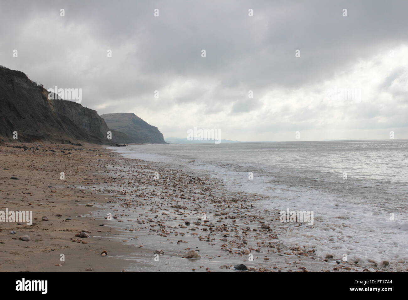 sea sand cliff and sky Stock Photo - Alamy