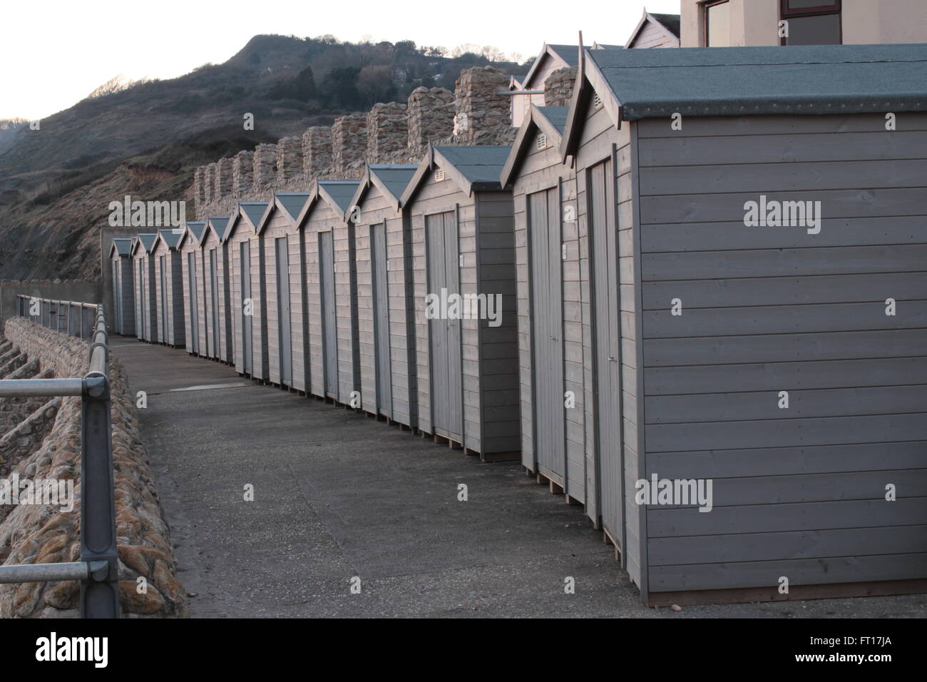 gray wooden huts facing the sun Stock Photo - Alamy