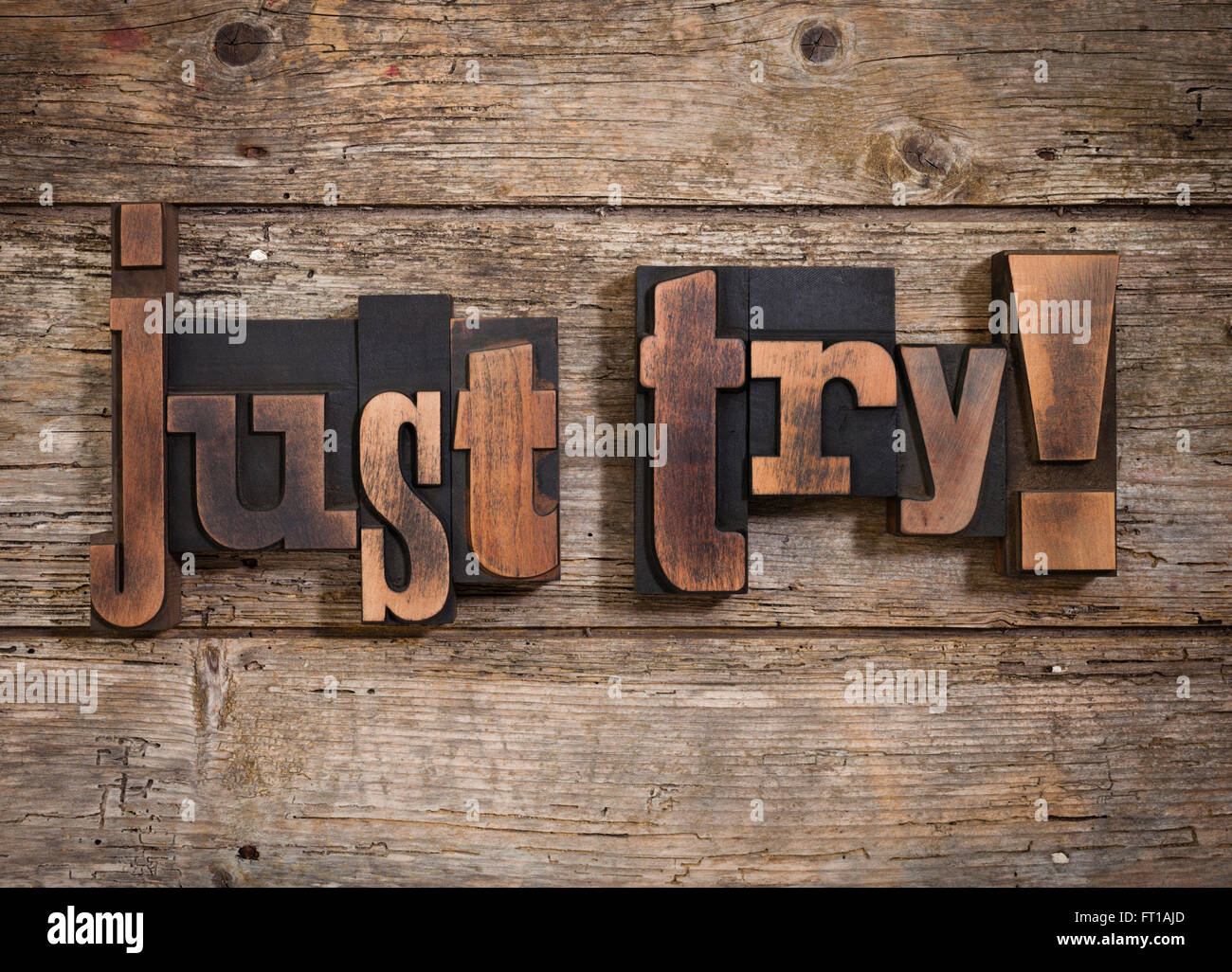 Just try!, phrase written with vintage letterpress printing blocks on ...