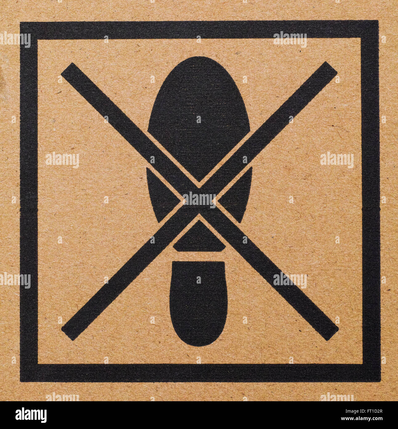 Do not step sign on cardboard Stock Photo - Alamy