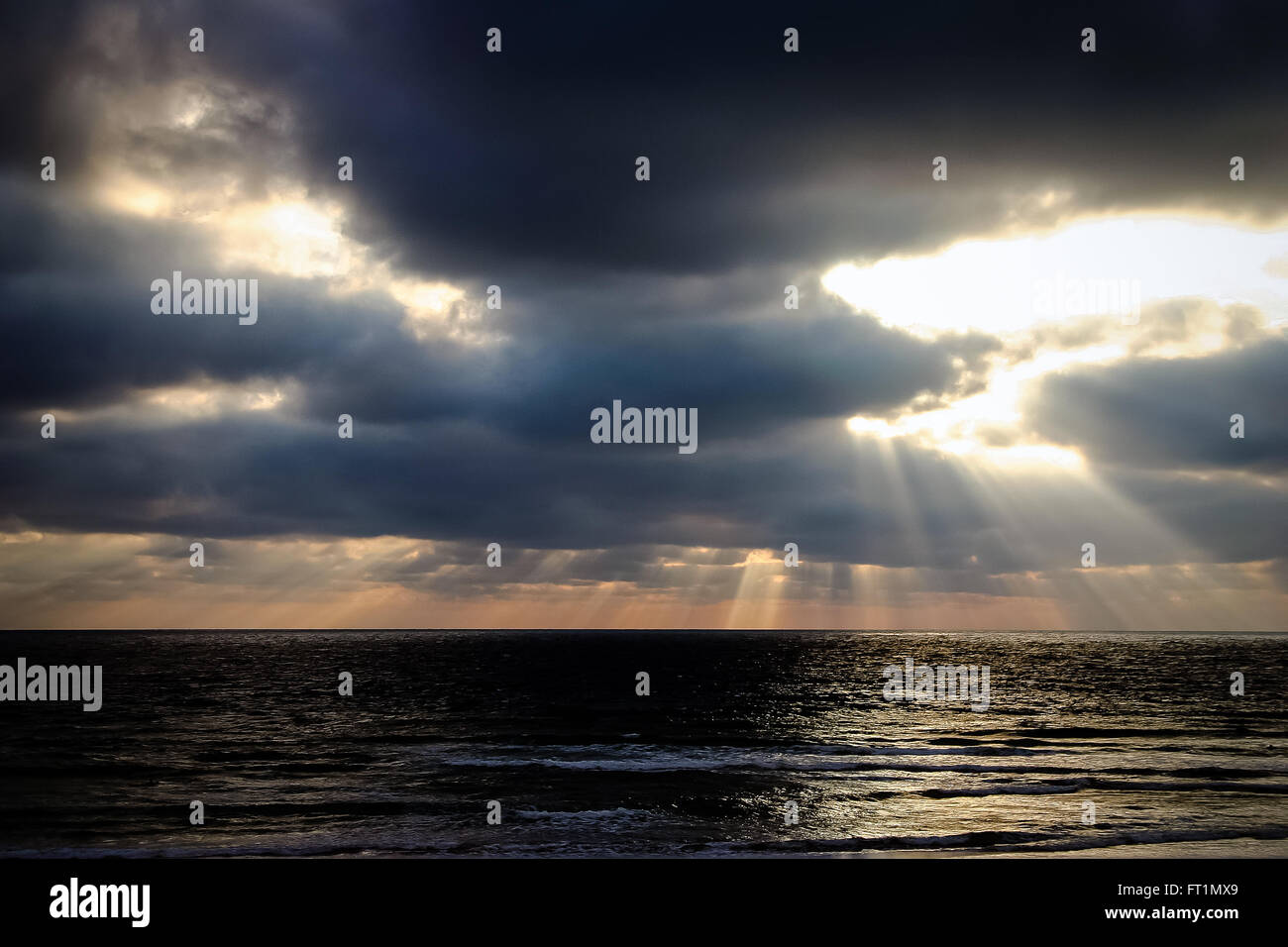 God rays above the sea Stock Photo - Alamy