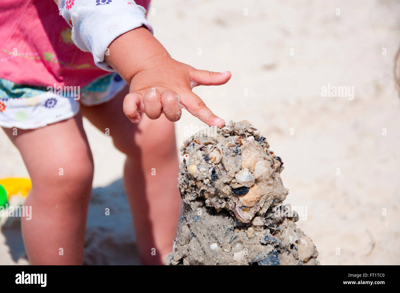 Child fingers sand hi-res stock photography and images - Alamy