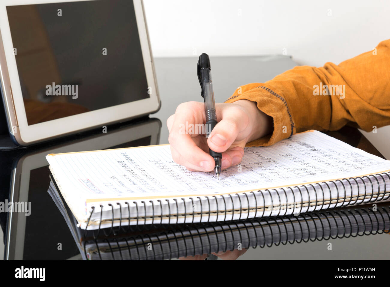 Teen reading digital tablet table hi-res stock photography and images ...