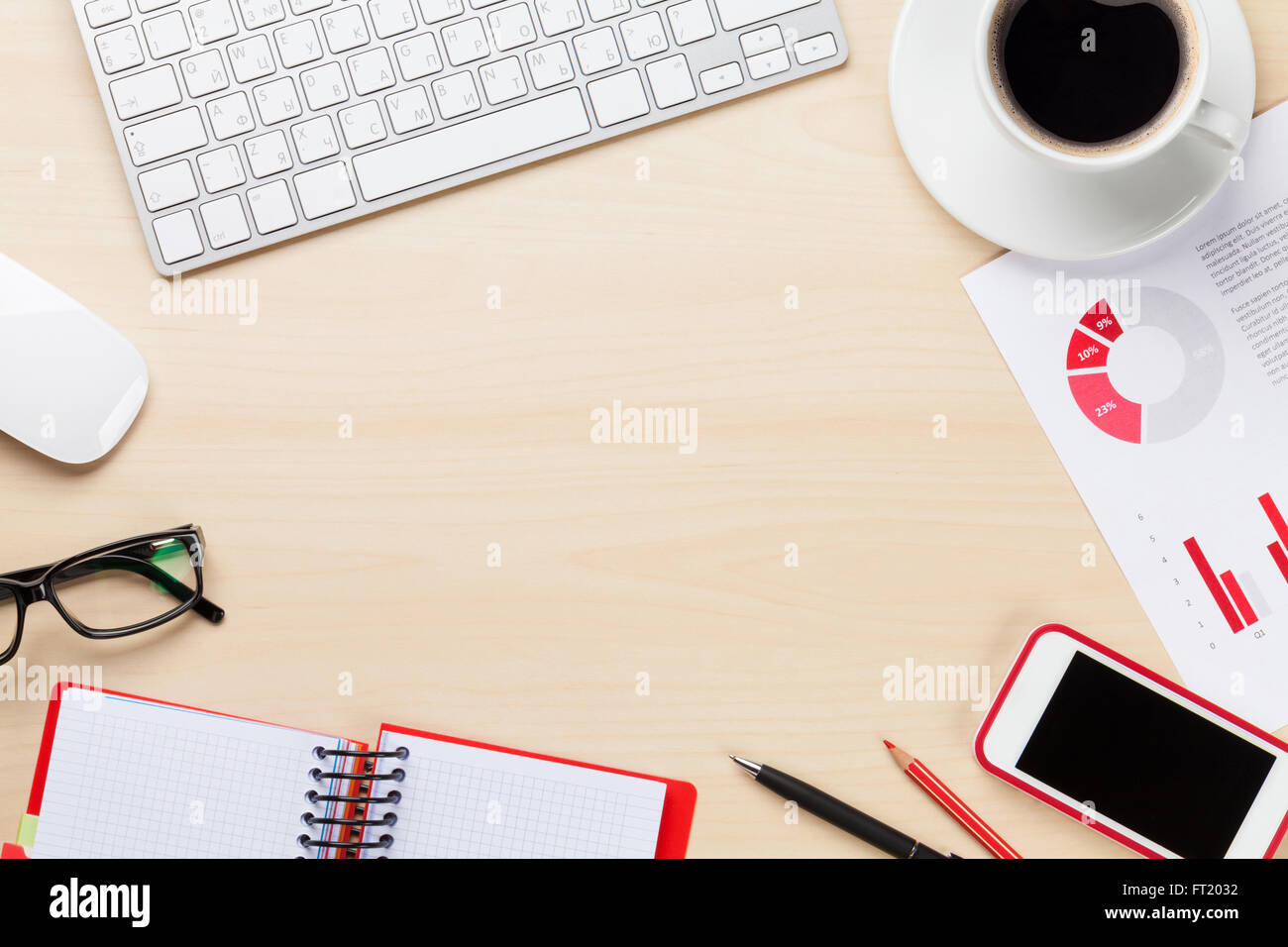 Office desk workplace with pc, charts and coffee on wooden table. Top ...