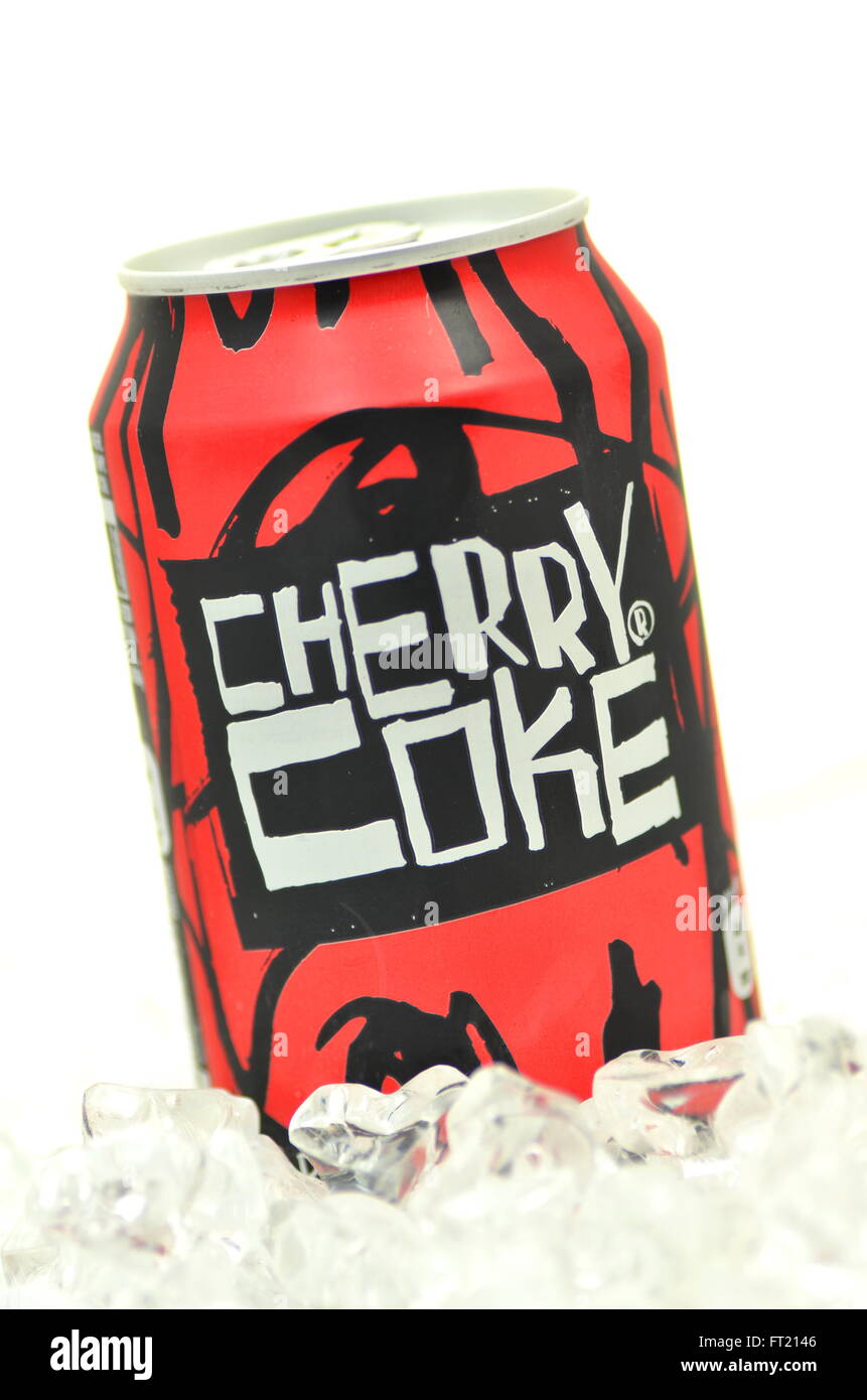 Cherry Coke drink on ice cubes Stock Photo - Alamy