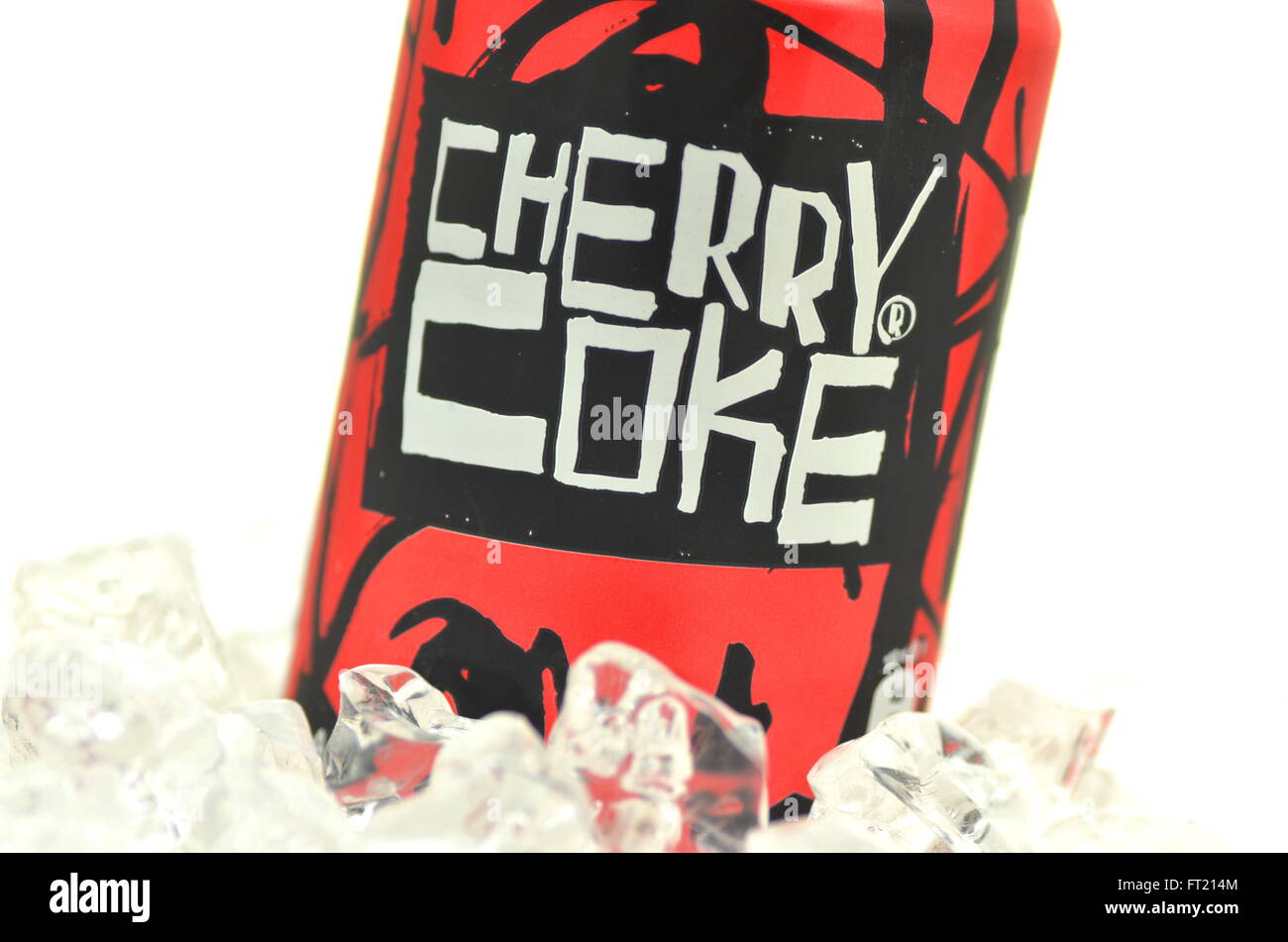 Cherry Coke drink on ice cubes Stock Photo - Alamy
