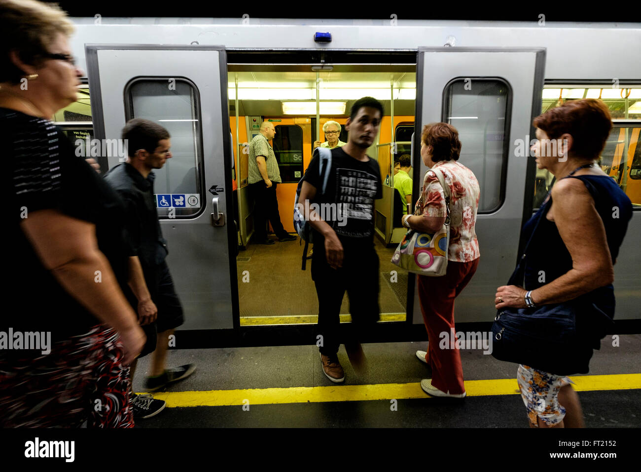 Entering tube station hi-res stock photography and images - Alamy
