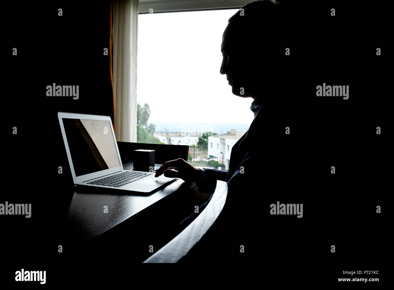 Teen using computer silhouette hi-res stock photography and images - Alamy