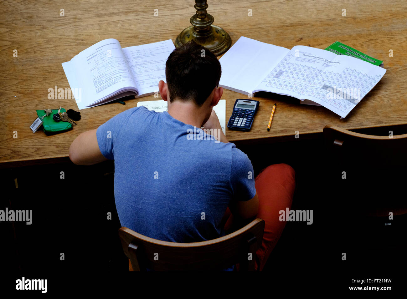 Student doing maths with calculator hi-res stock photography and images ...