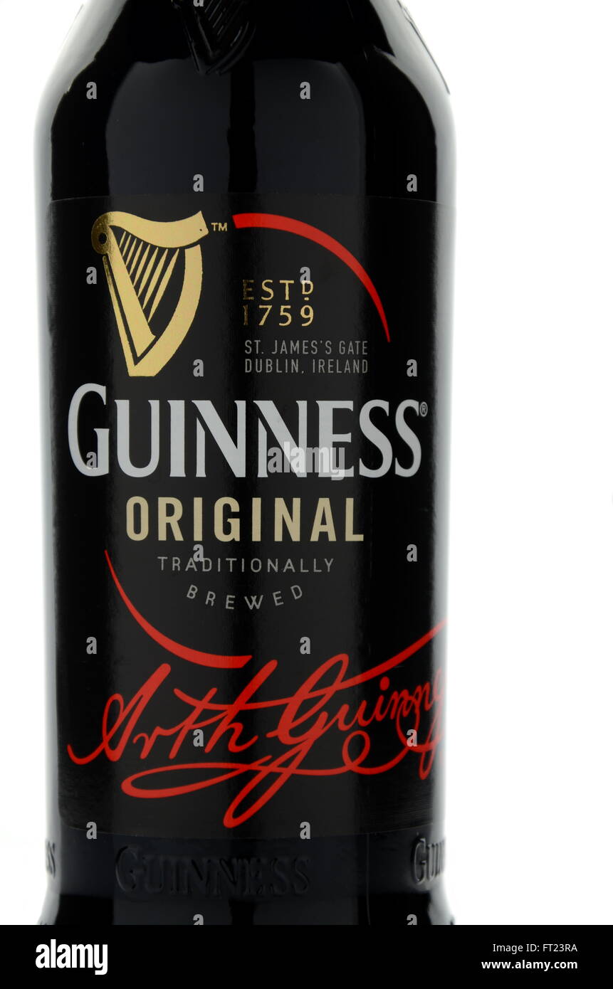 Guinness dry stout beer isolated on white background. Guinness beer has ...