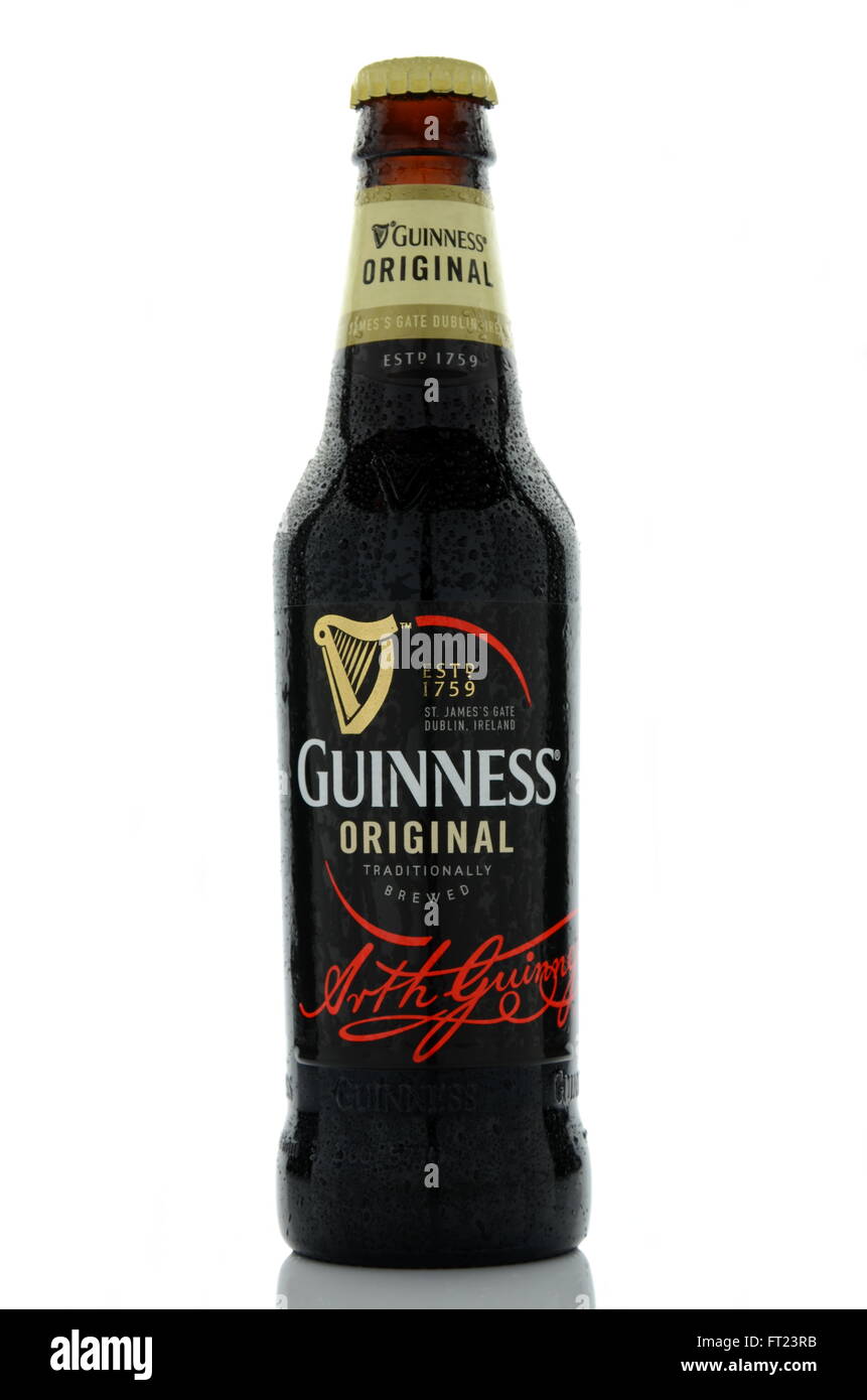 Guinness dry stout beer isolated on white background. Guinness beer has ...