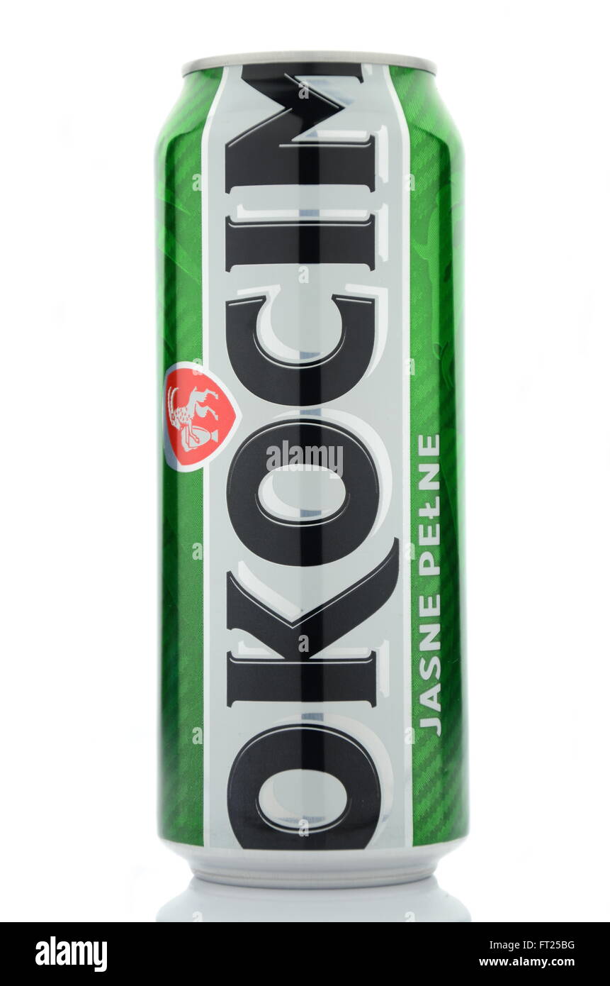 Okocim full light beer isolated on white background. Okocim Brewery was ...