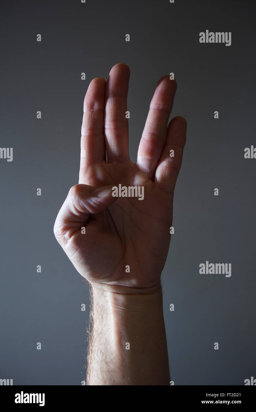 A hand probably male making a hadn sign universal understood around the ...