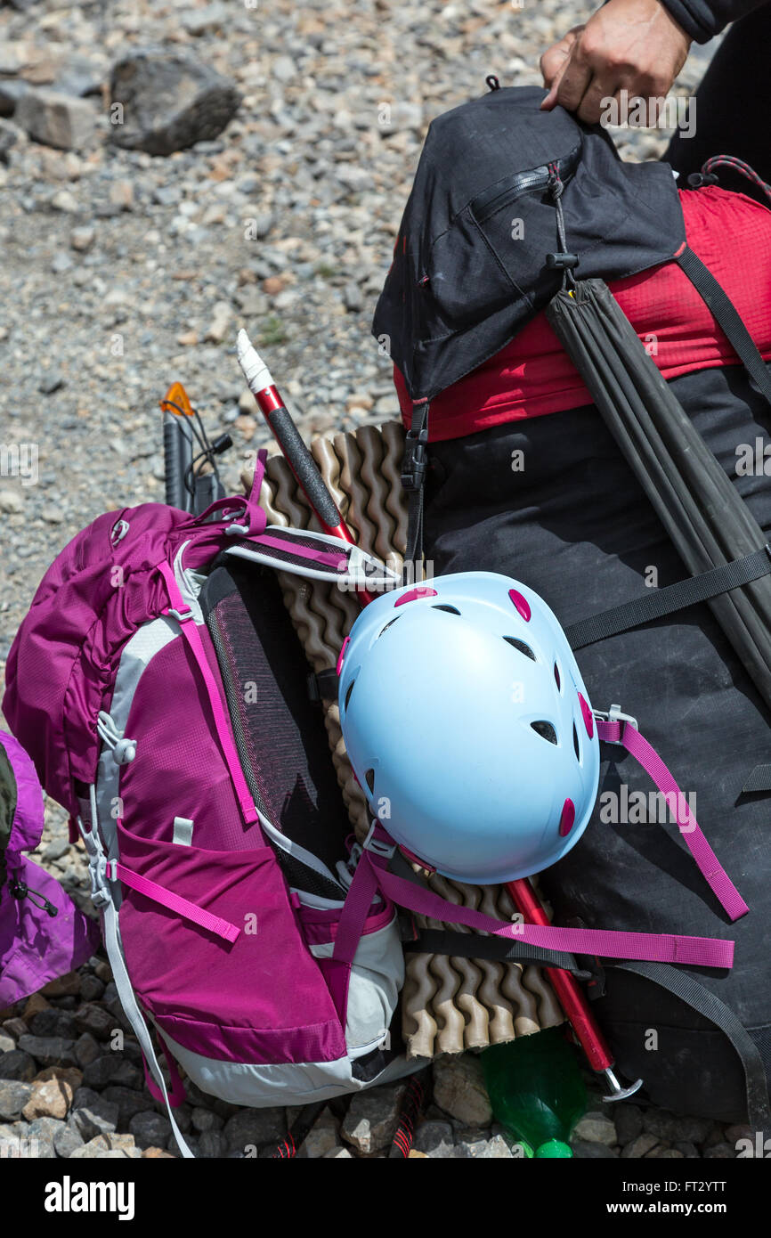 Hiker Packing Backpack Stock Photo - Alamy