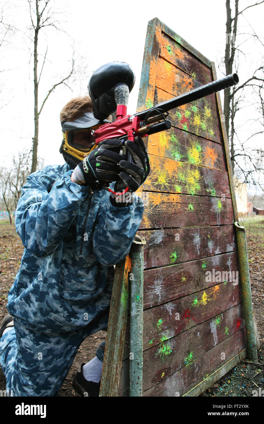 Gun and mask for game in a paintball Stock Photo - Alamy
