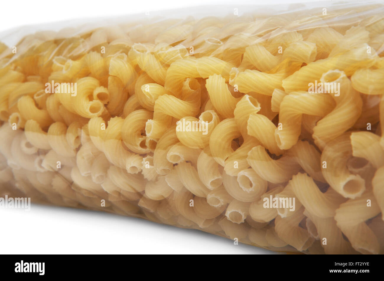 Beautiful macaroni in cellophane packing on a white background Stock ...