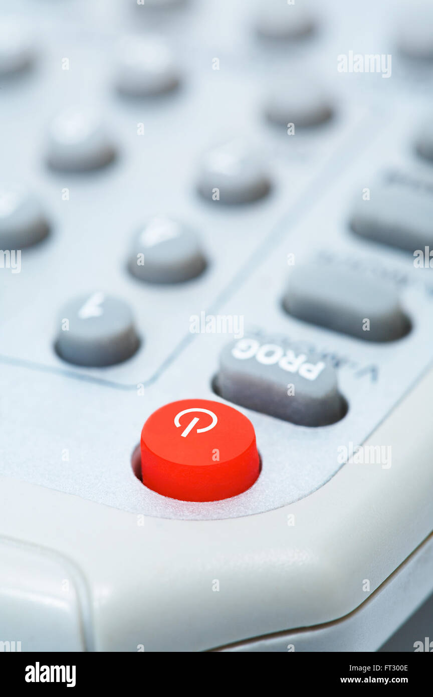 The red button of inclusion on a remote control Stock Photo - Alamy
