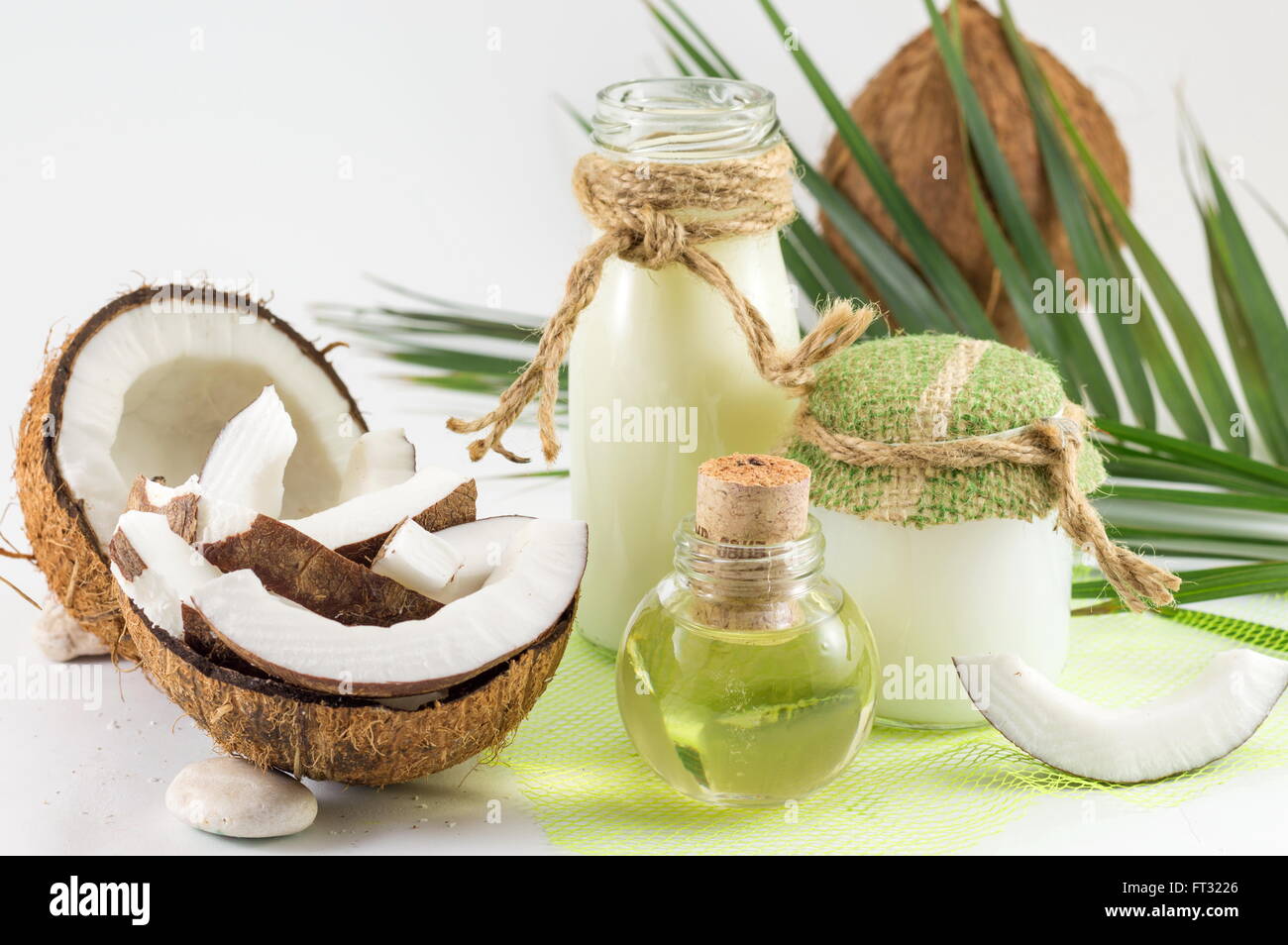 Coconut products with fresh coconut, Coconut milk and oil Stock Photo ...