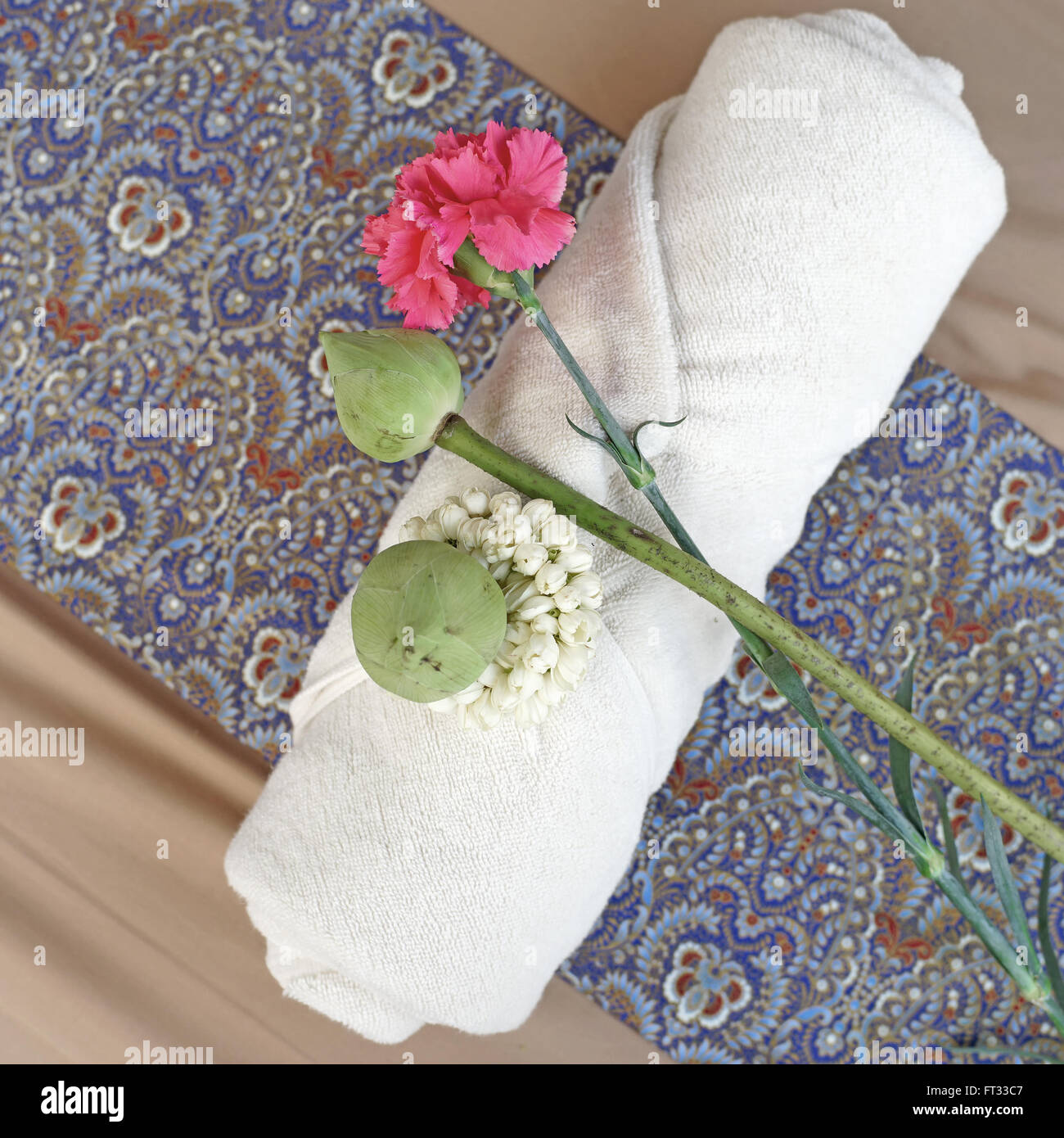 lotus jasmine and carnation flower on white bath towel Stock Photo - Alamy