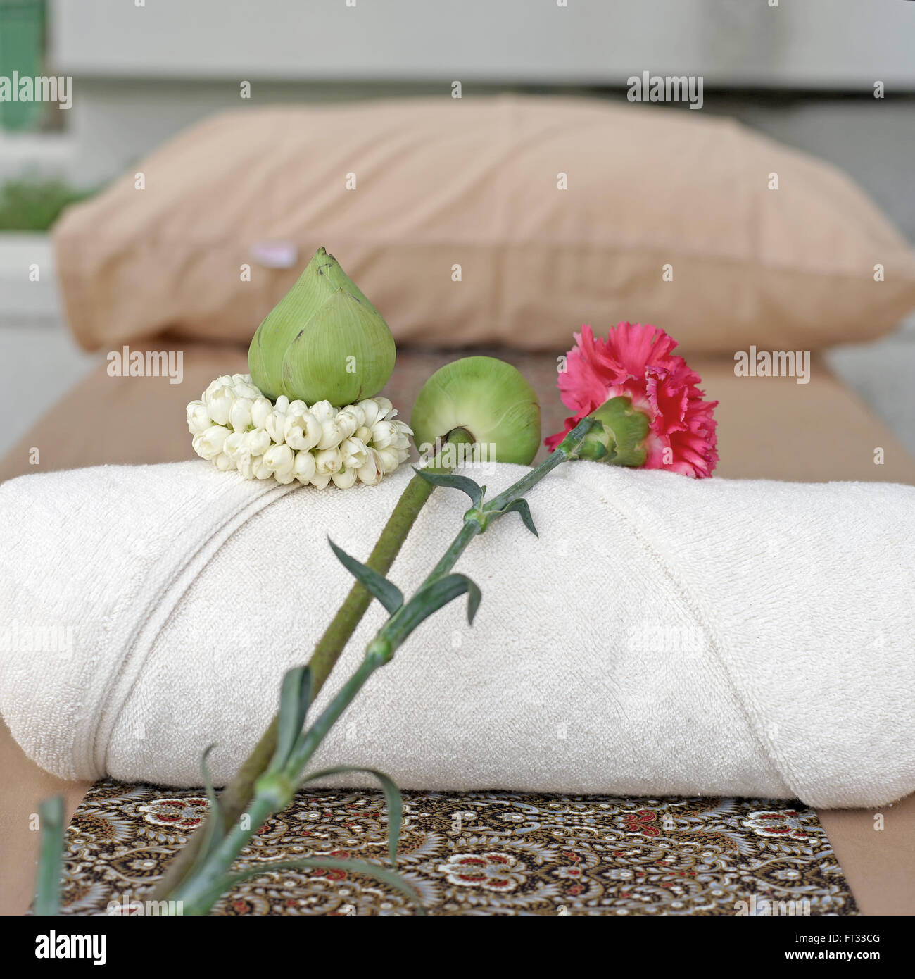 lotus jasmine and carnation flower on white bath towel Stock Photo - Alamy