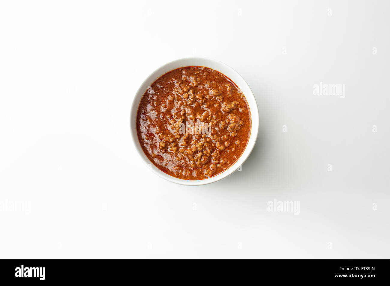 Bowl of chili on a white background Stock Photo - Alamy