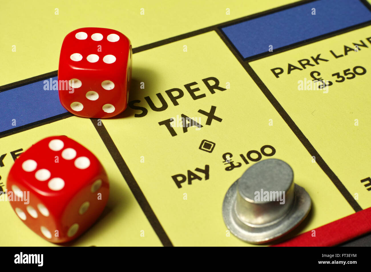 Super tax on monopoly board hi-res stock photography and images - Alamy