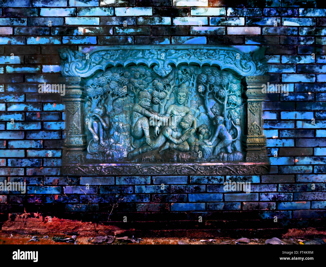 Ancient blue carving and ancient blick wall background Stock Photo - Alamy