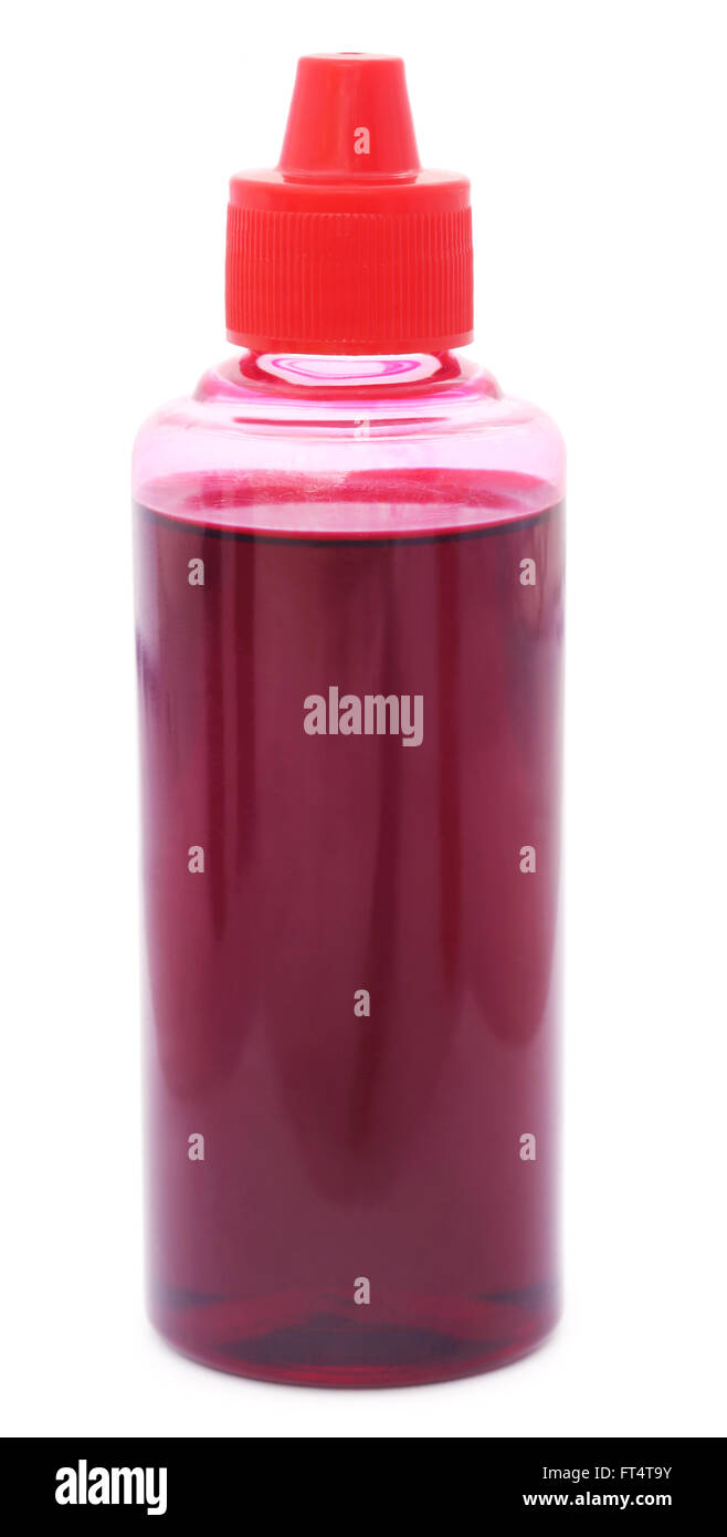 Printer ink bottle of magenta color over white background Stock Photo ...