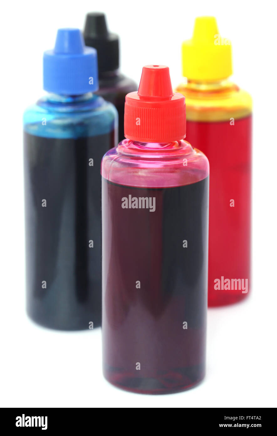 Printer ink bottles over white background Stock Photo - Alamy