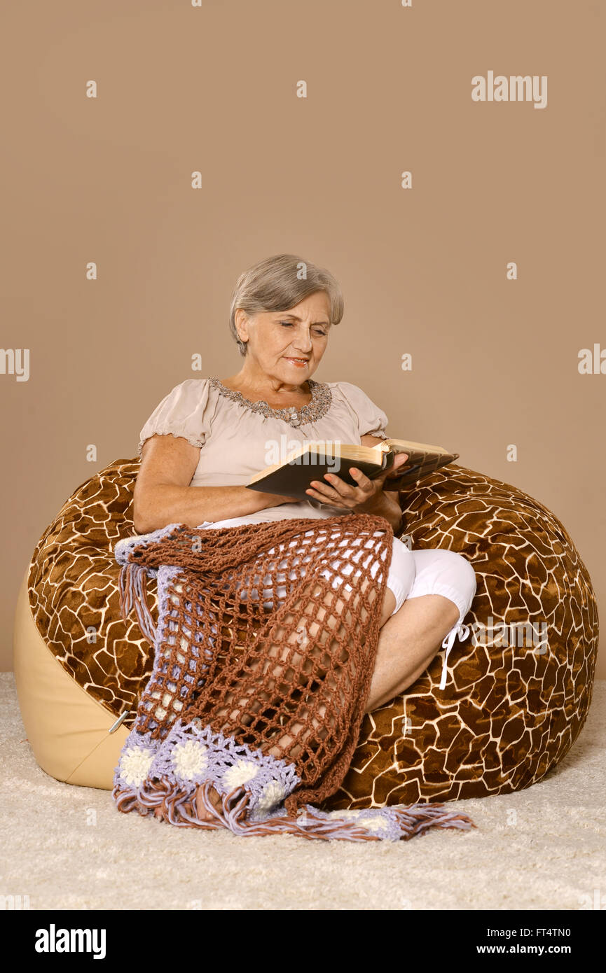 Senior lady reading Stock Photo - Alamy