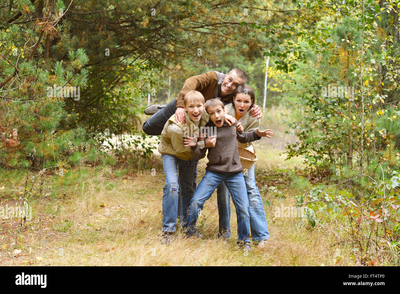 Family of four playing Stock Photo - Alamy