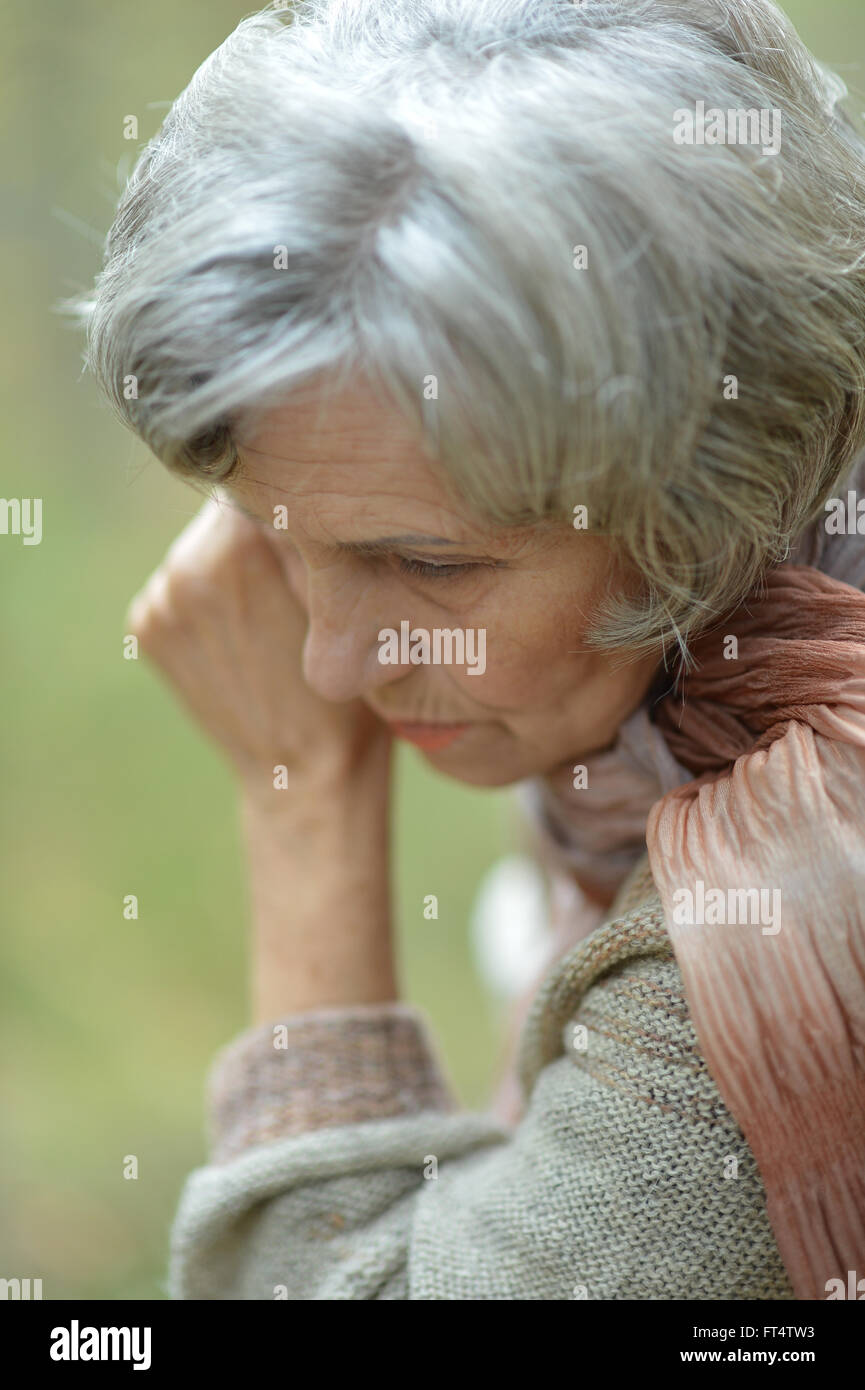 thinking elderly woman Stock Photo - Alamy