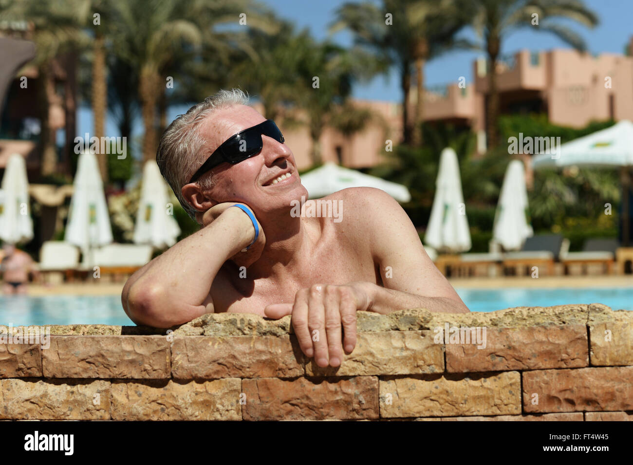 man swimming in pool Stock Photo - Alamy