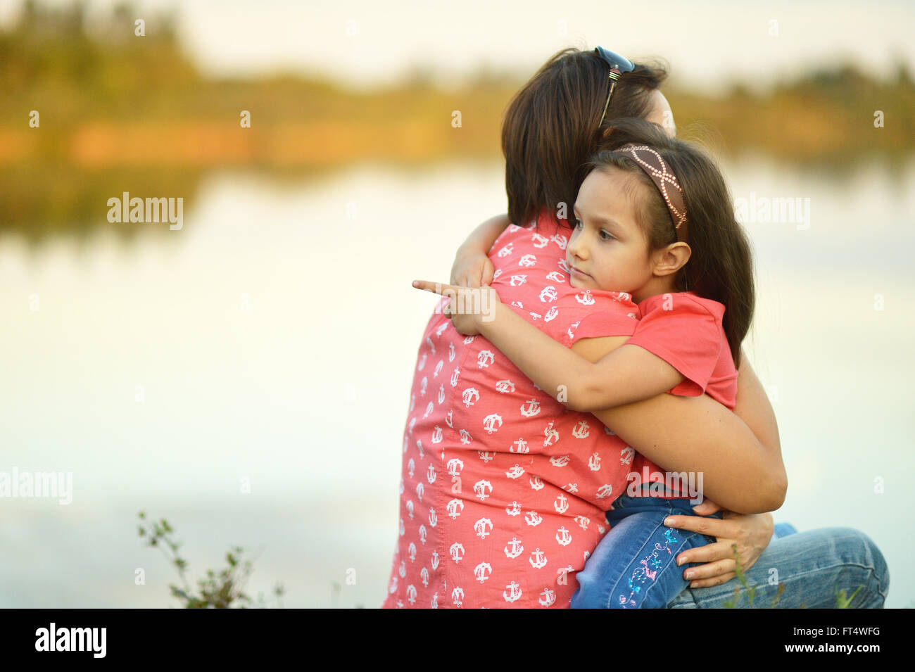 girl hugging her mother Stock Photo - Alamy