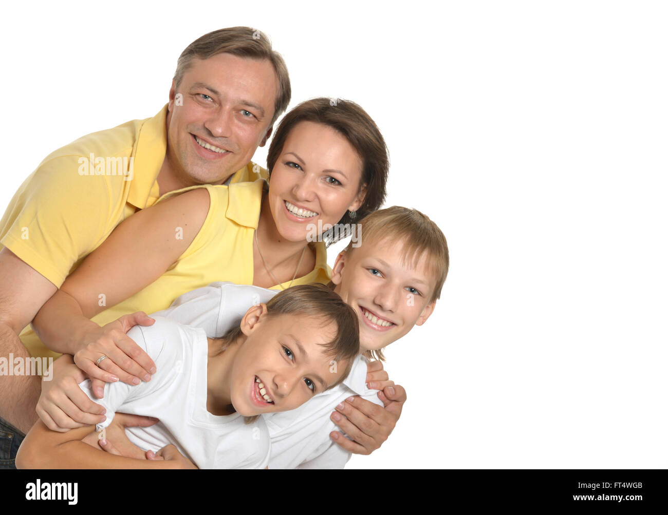 Happy family of four Stock Photo - Alamy