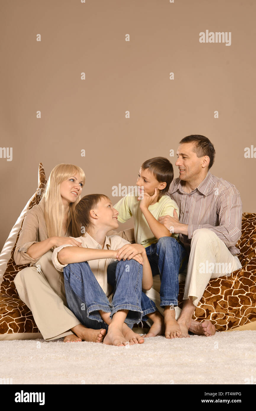 Family resting at home Stock Photo - Alamy