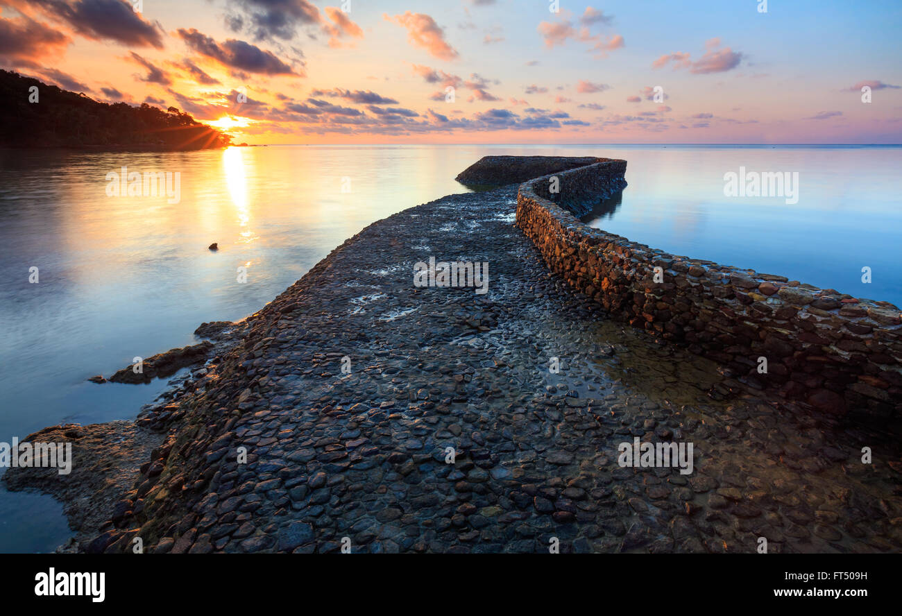 Seascape of path to the sea at sunset Stock Photo - Alamy