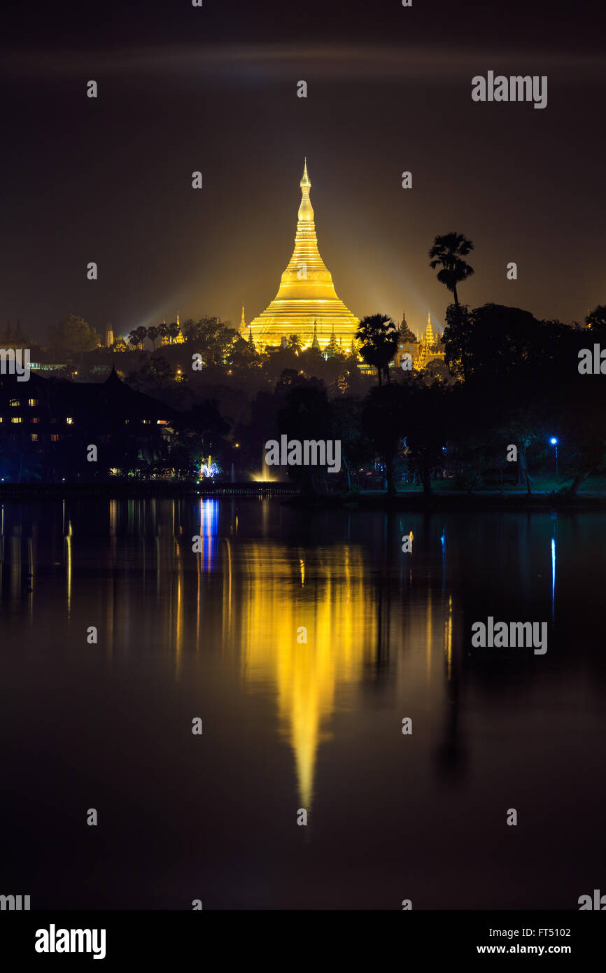 Shwedagon pagoda with lake reflection at night, Yangon,Myanmar Stock ...