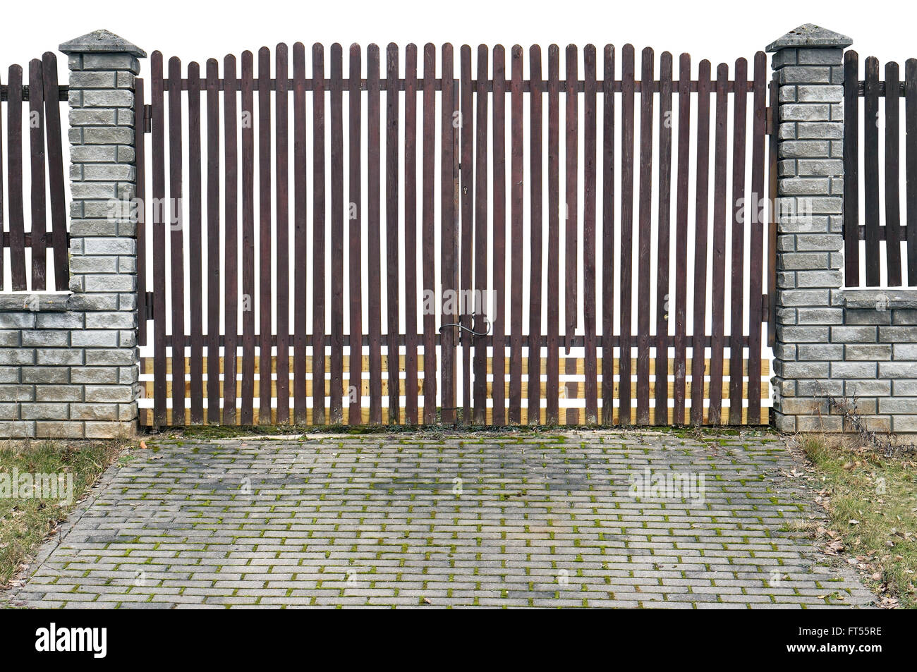 Wooden Gate Between Brick Column