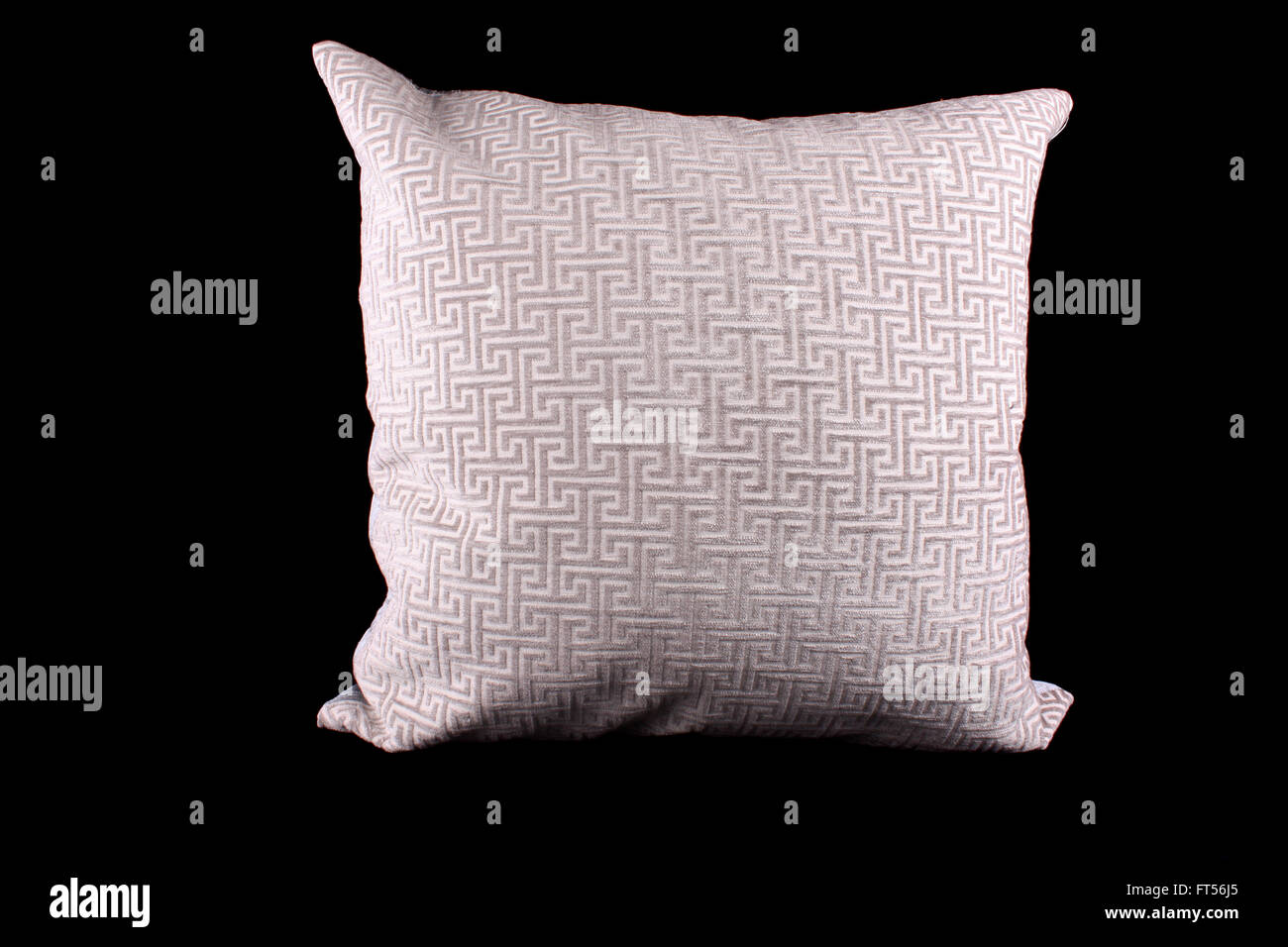 A white square shaped pillow with a beautiful designed white fabric ...