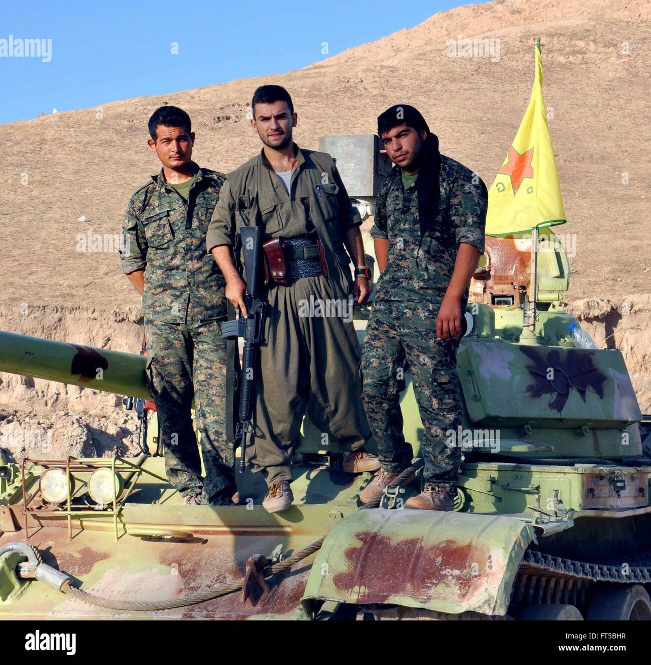 Fighters with the Kurdish YPG during operations against the Islamic ...