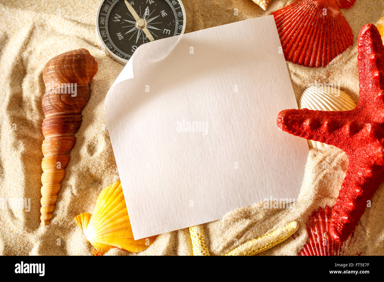 Compass sandy beach hi-res stock photography and images - Alamy
