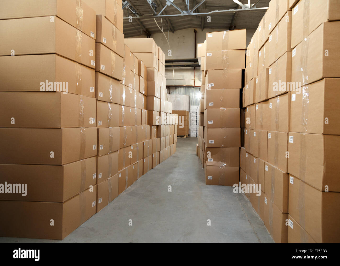 Paper products and goods storehouse with boxes Stock Photo - Alamy